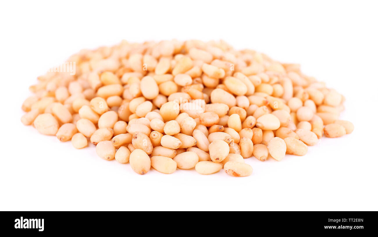 Cedar pine nuts isolated on white Stock Photo - Alamy