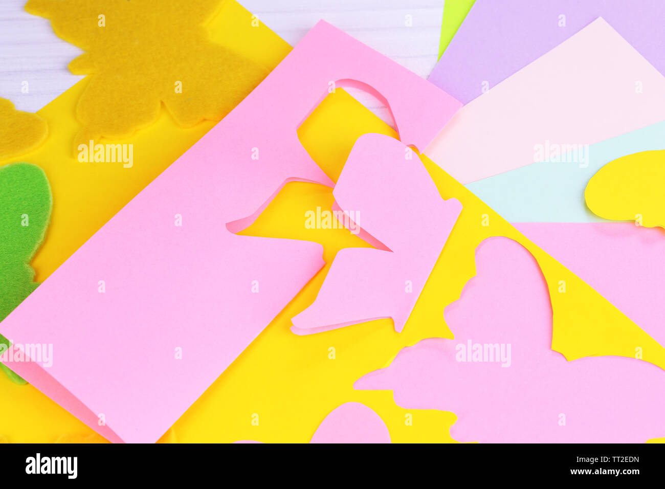 Women hand cutting colorful paper with scissors Stock Photo - Alamy