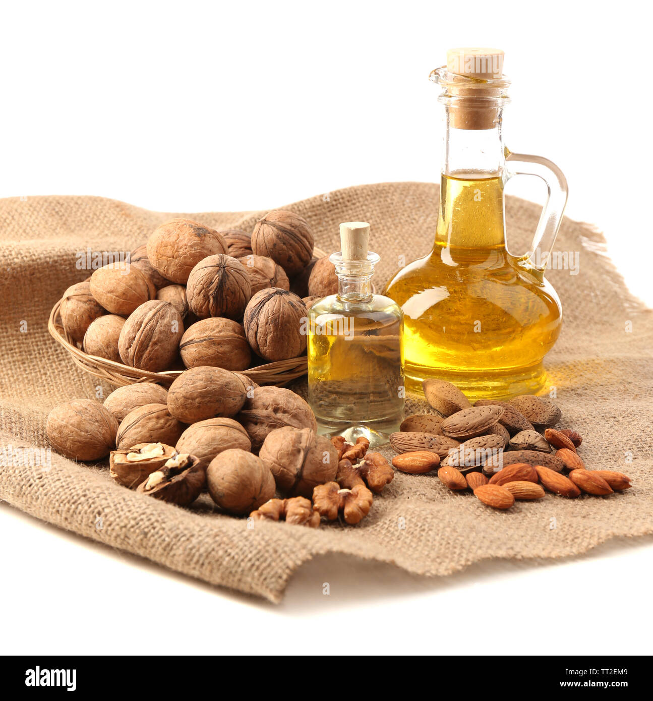 Walnut oil and nuts, isolated on white Stock Photo - Alamy