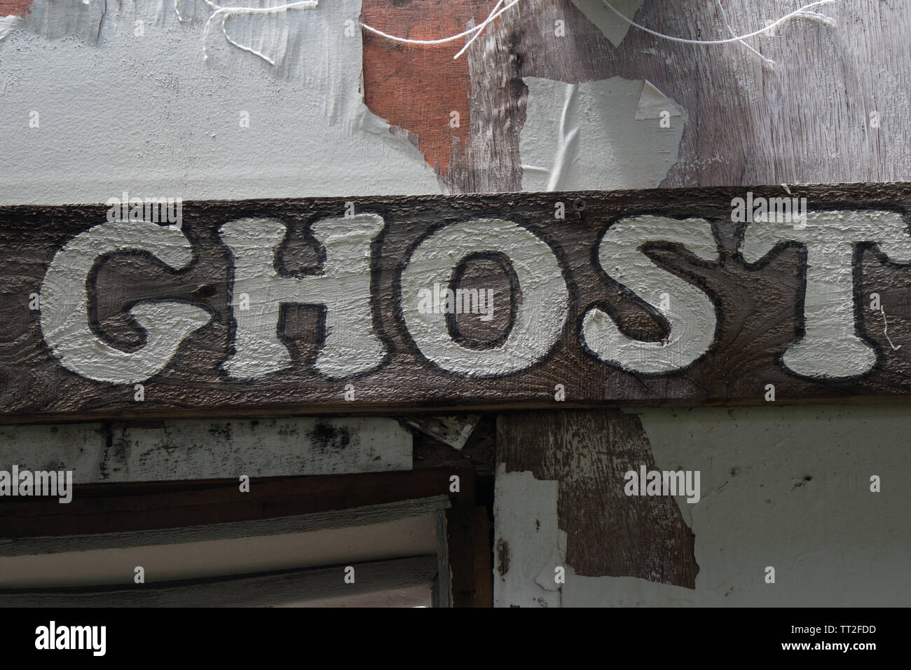 A wooden sign for a ghost town Stock Photo - Alamy