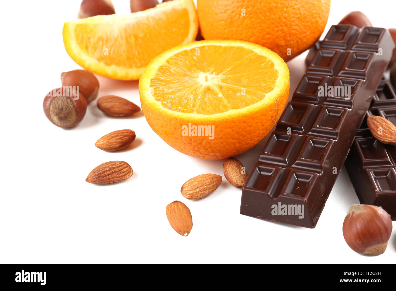 Chocolate, orange and nuts isolated on white Stock Photo - Alamy