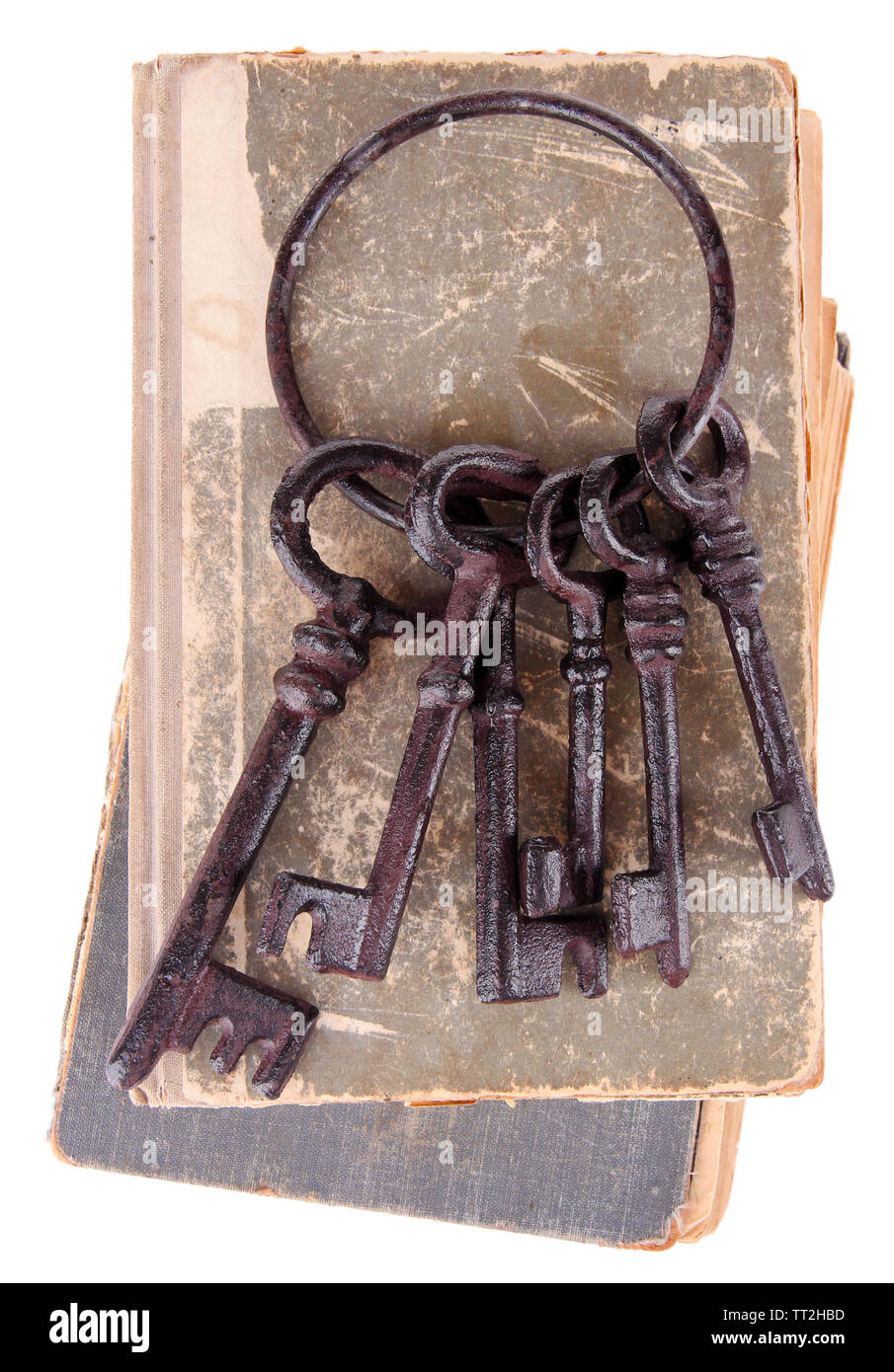 Old keys on old books isolated on white Stock Photo - Alamy