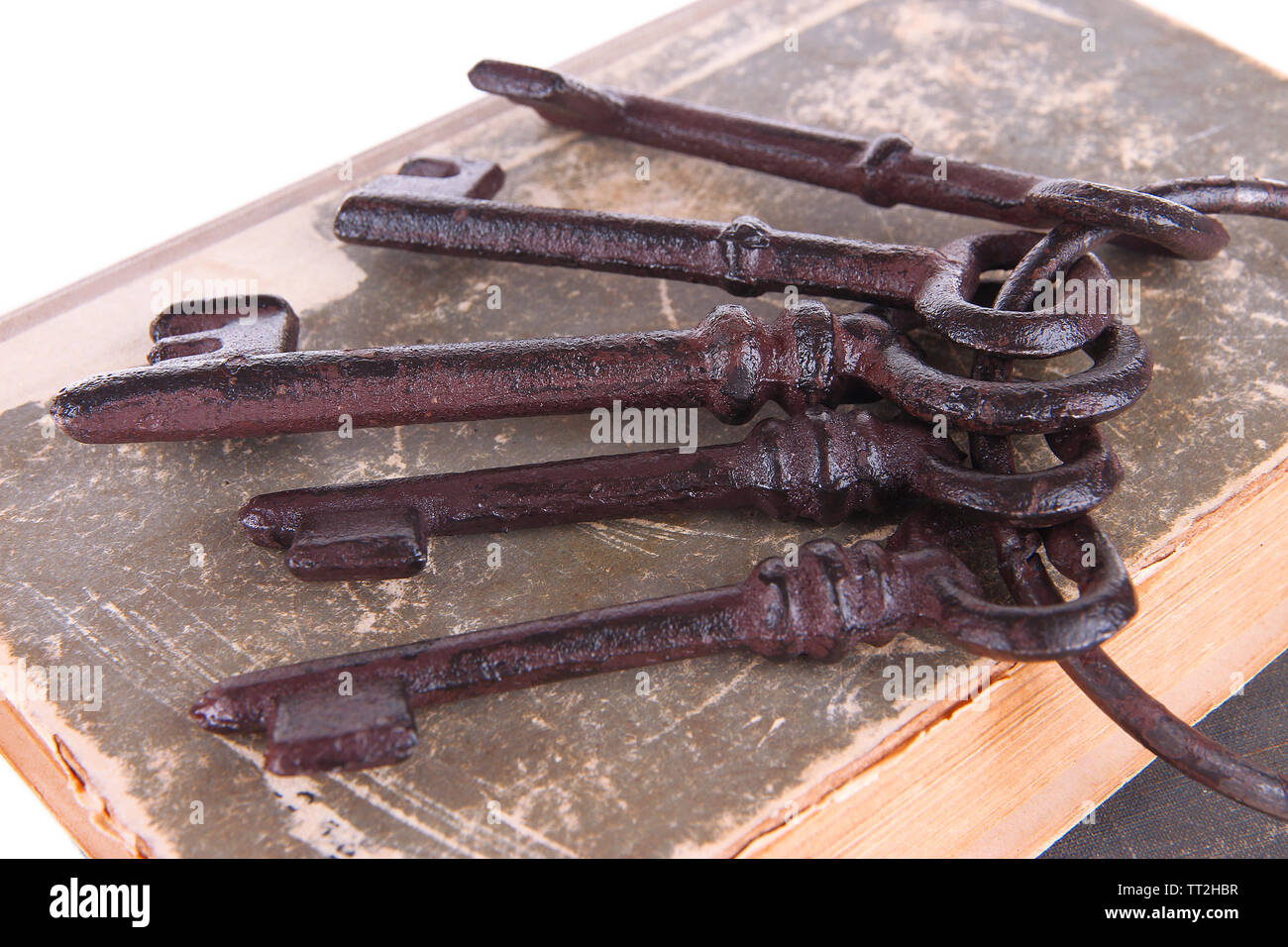 Old keys on old books close up Stock Photo - Alamy