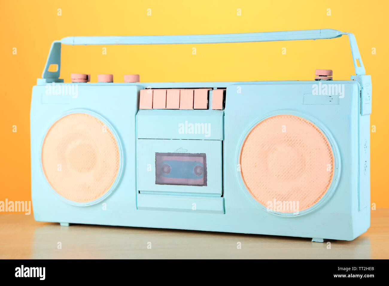 Colorful retro radio, on yellow background Stock Photo - Alamy