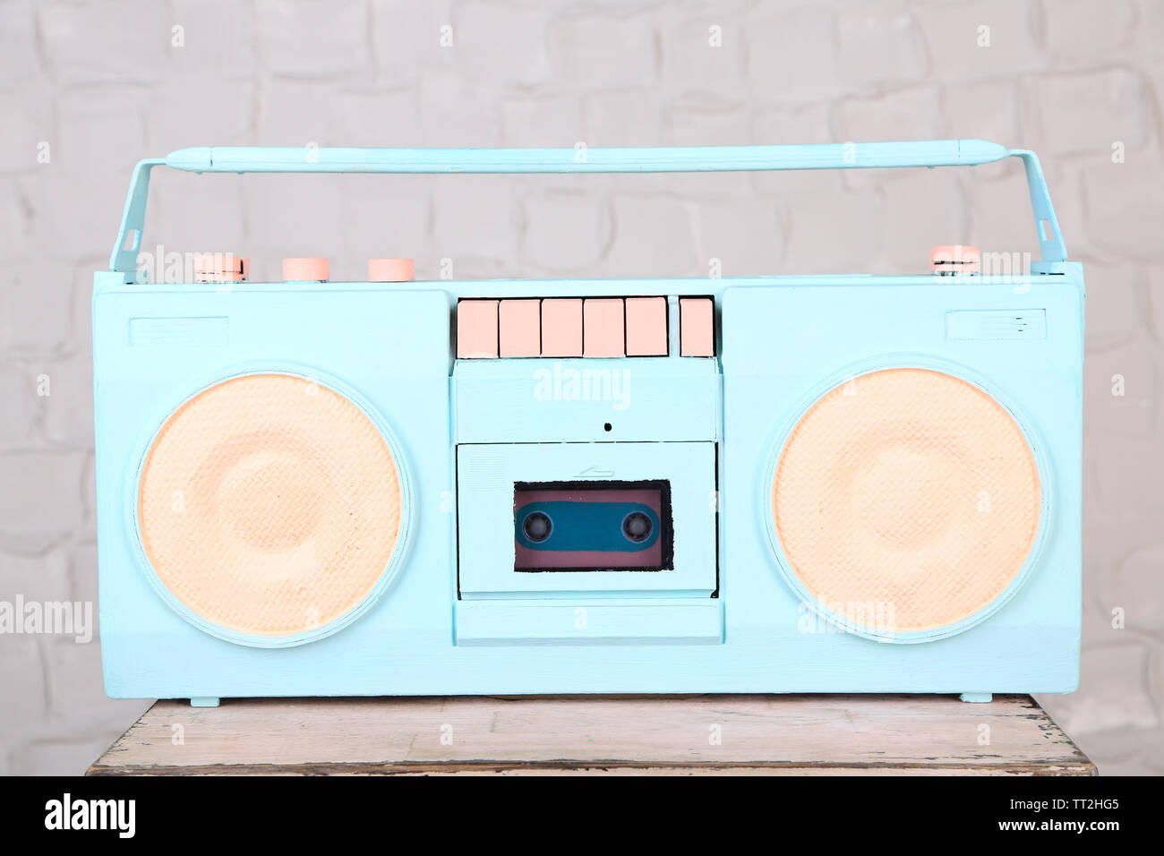 Colorful retro radio, on grey wall wooden background Stock Photo - Alamy