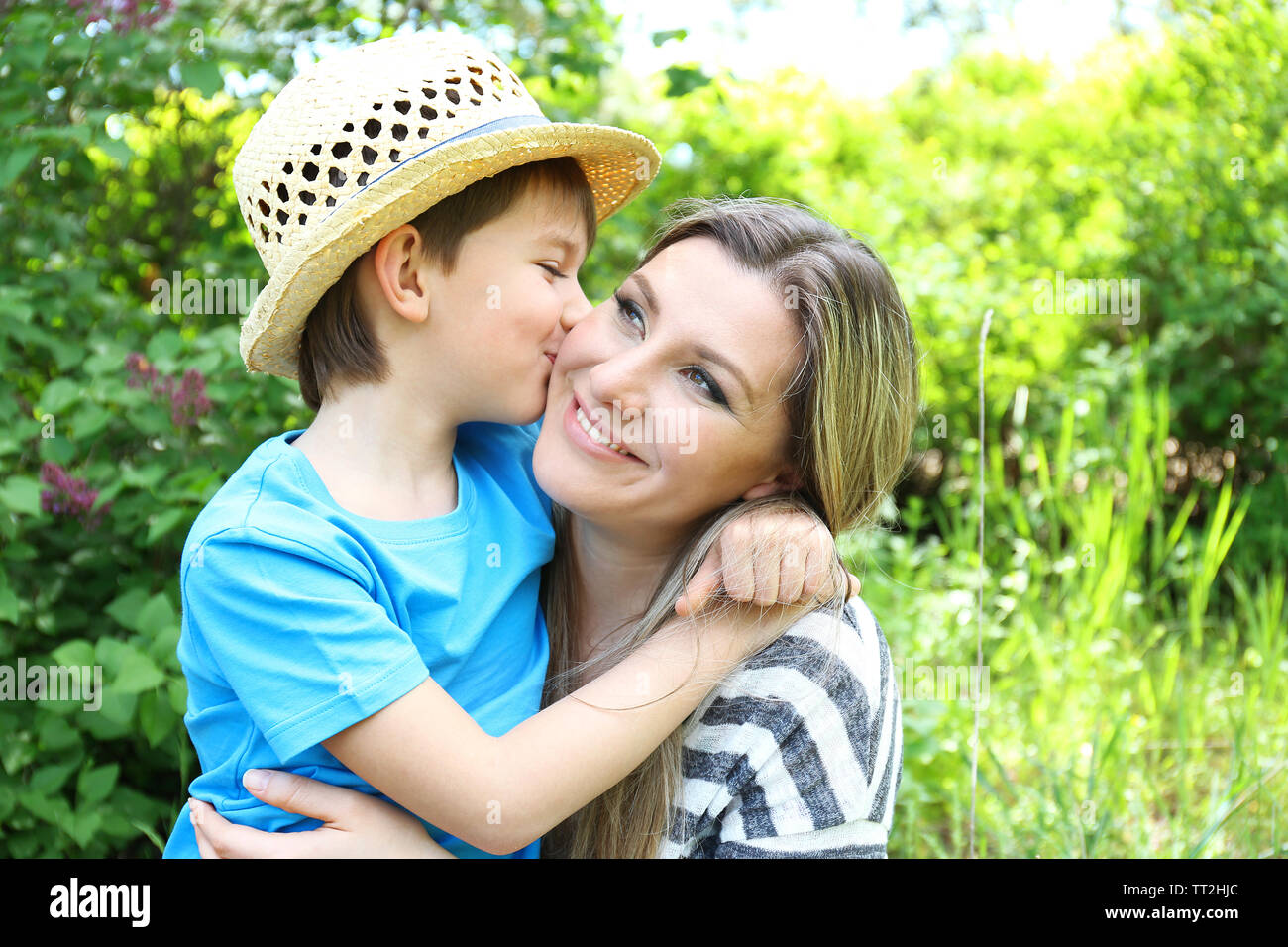 Happy mom and son in the park Stock Photo - Alamy