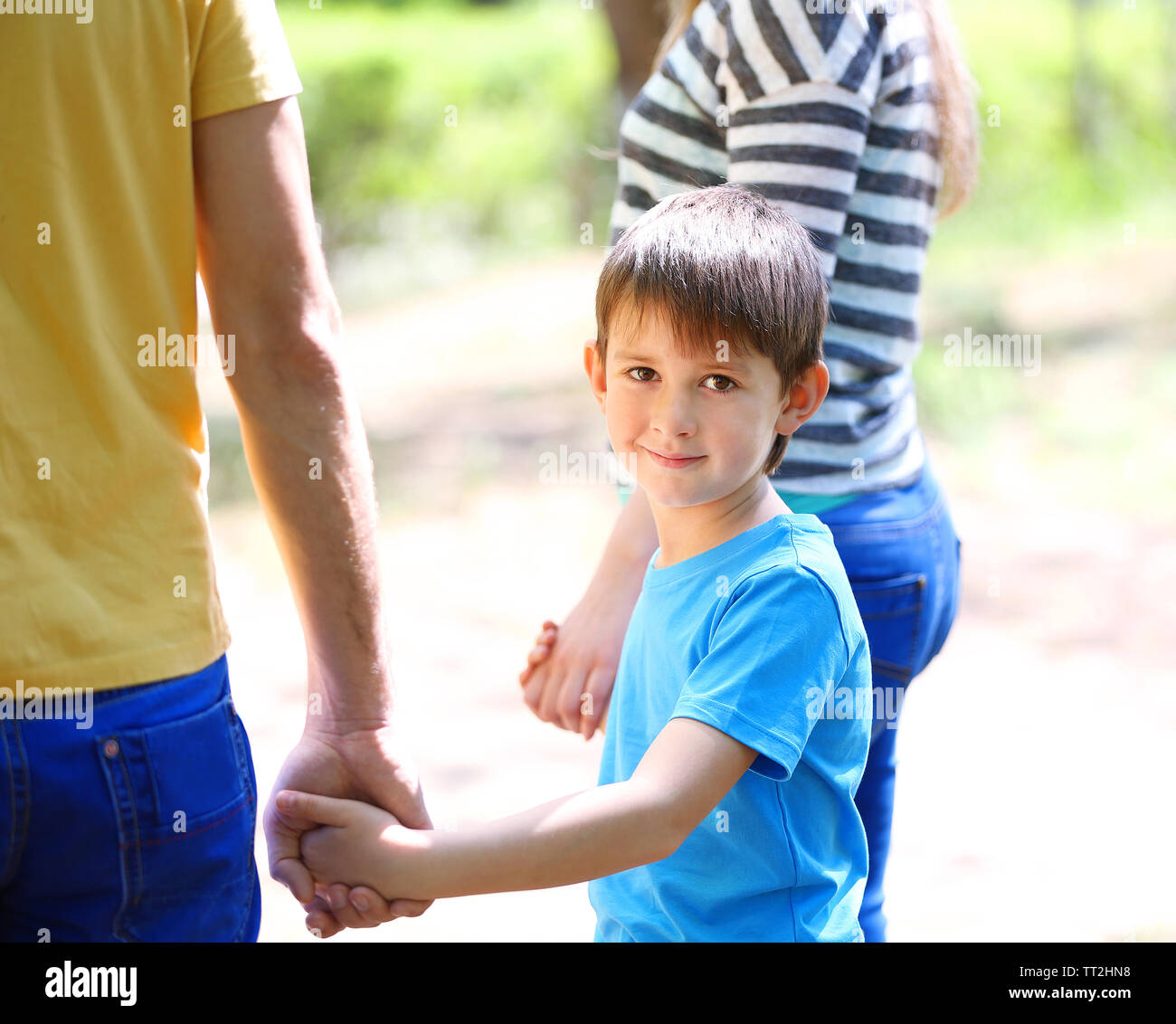 Family walk sunny day father mother happy park hi-res stock photography ...