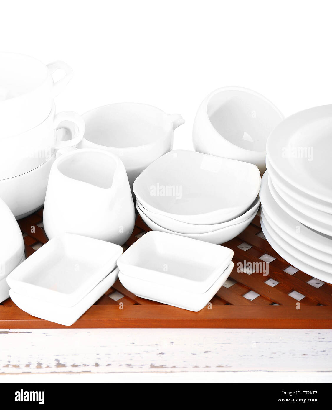 Different tableware on shelf, close up Stock Photo - Alamy