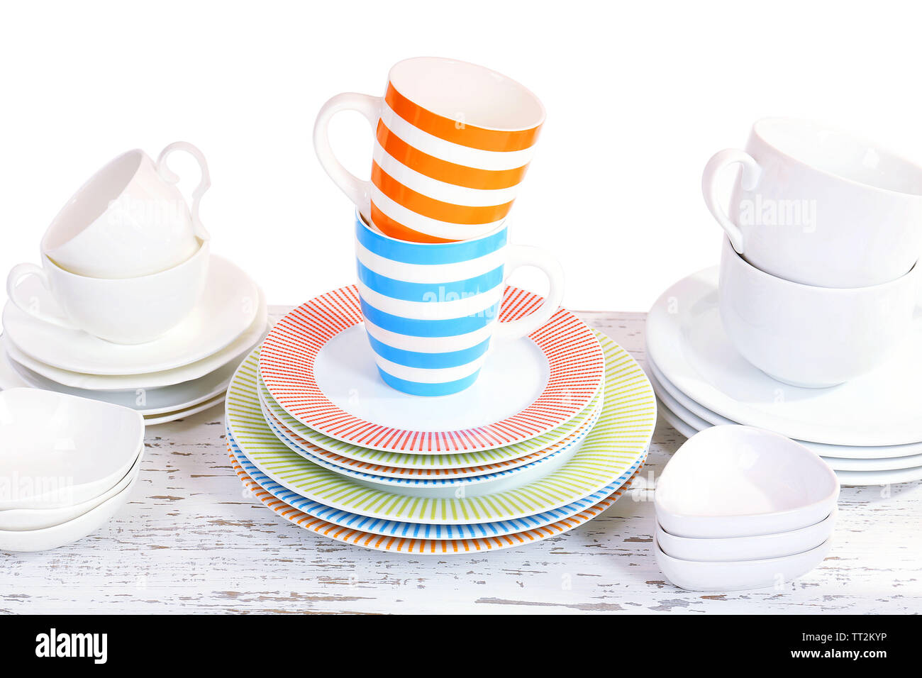 Different tableware on shelf, isolated on white Stock Photo - Alamy