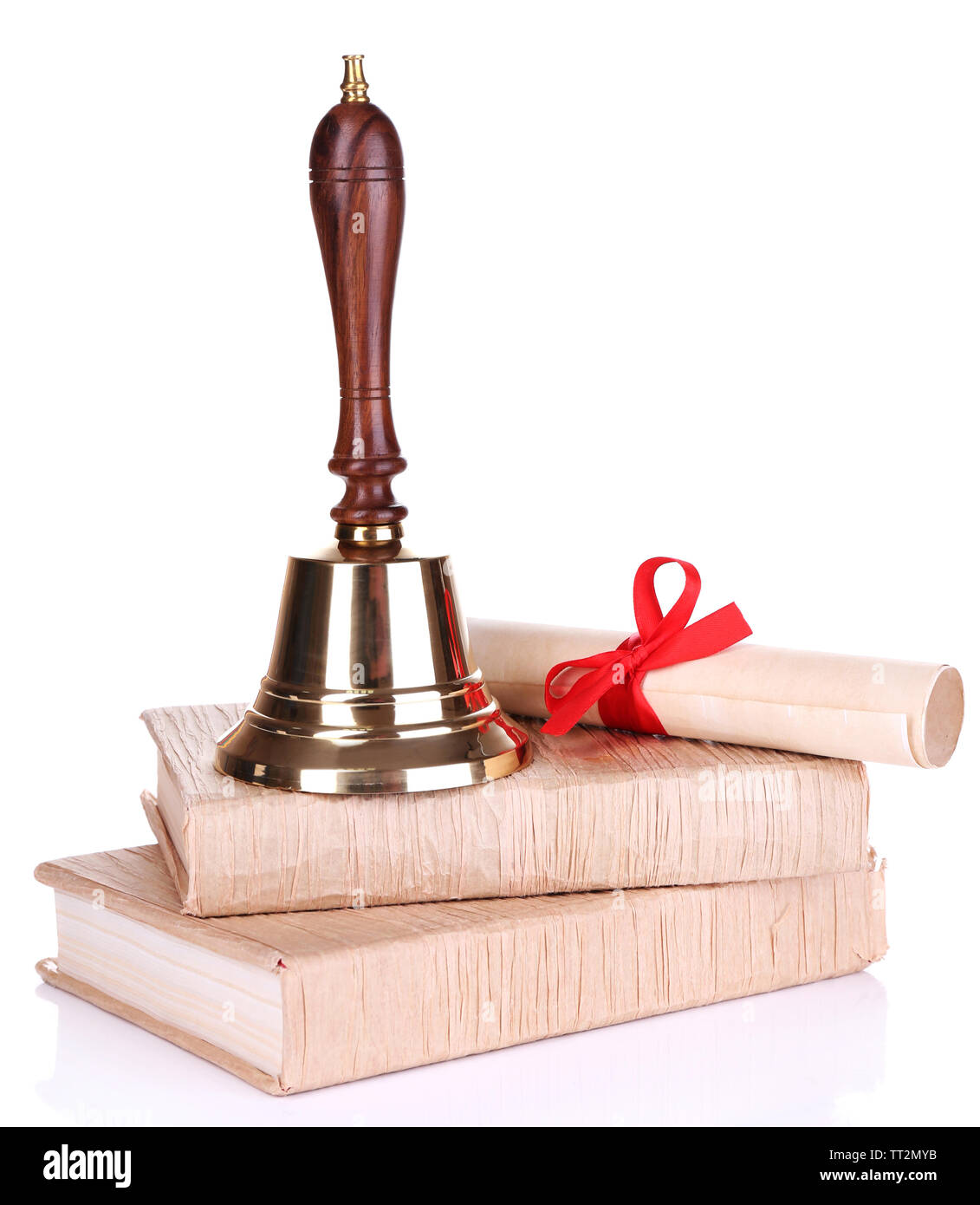 Gold retro school bell with scroll and books isolated on white Stock ...