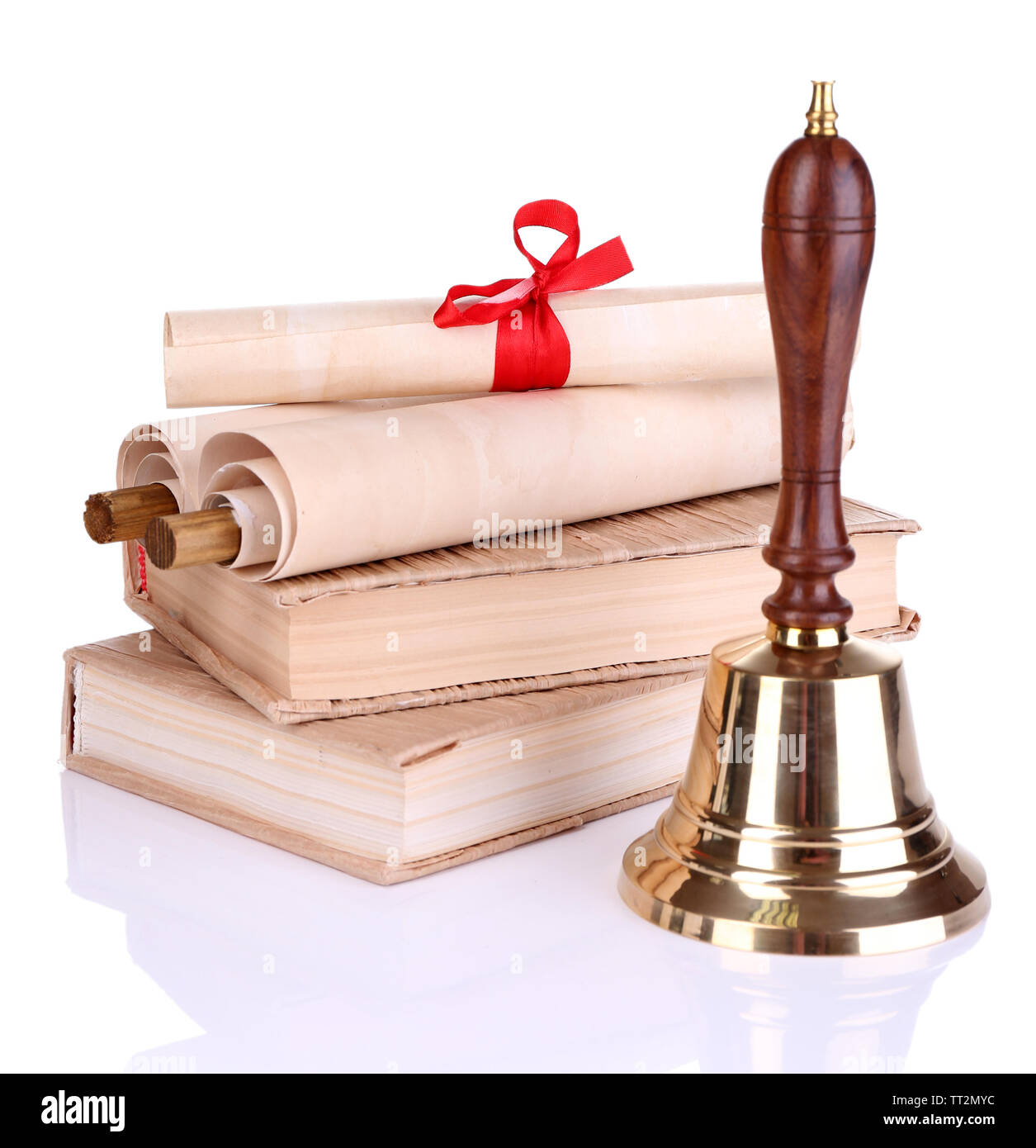 Gold retro school bell with scroll and books isolated on white Stock ...