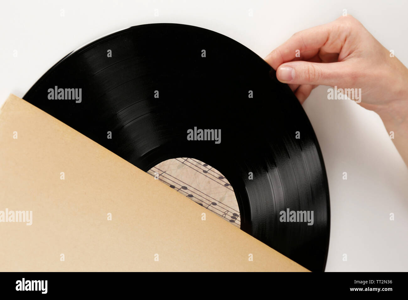 Hands opening old vinyl record, isolated on white Stock Photo - Alamy Hands opening old vinyl record, isolated on white Stock Photo - Alamy