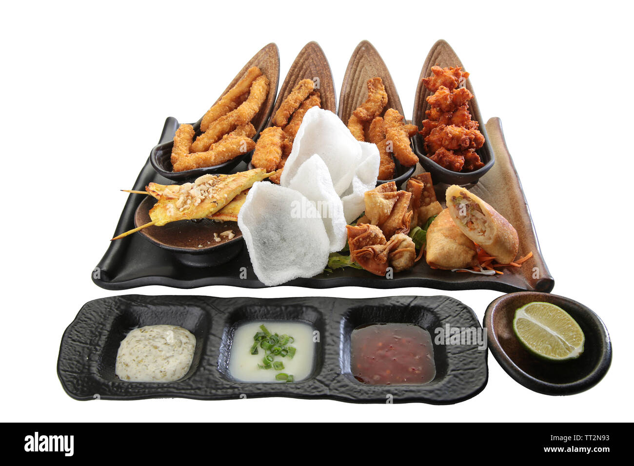 appetizer combo plate with various sauces white background Stock Photo ...