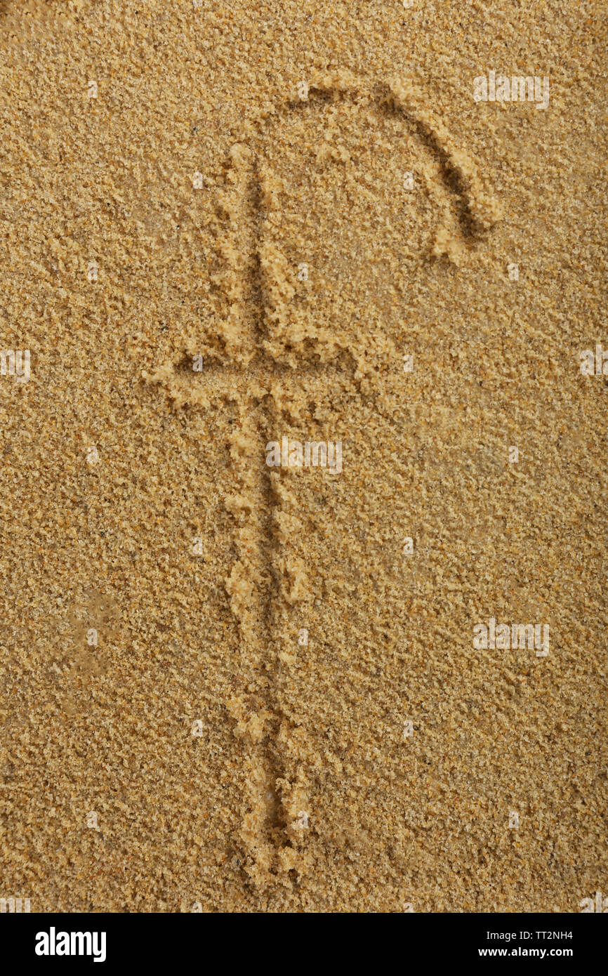 Alphabet letter written on wet beach sand Stock Photo - Alamy