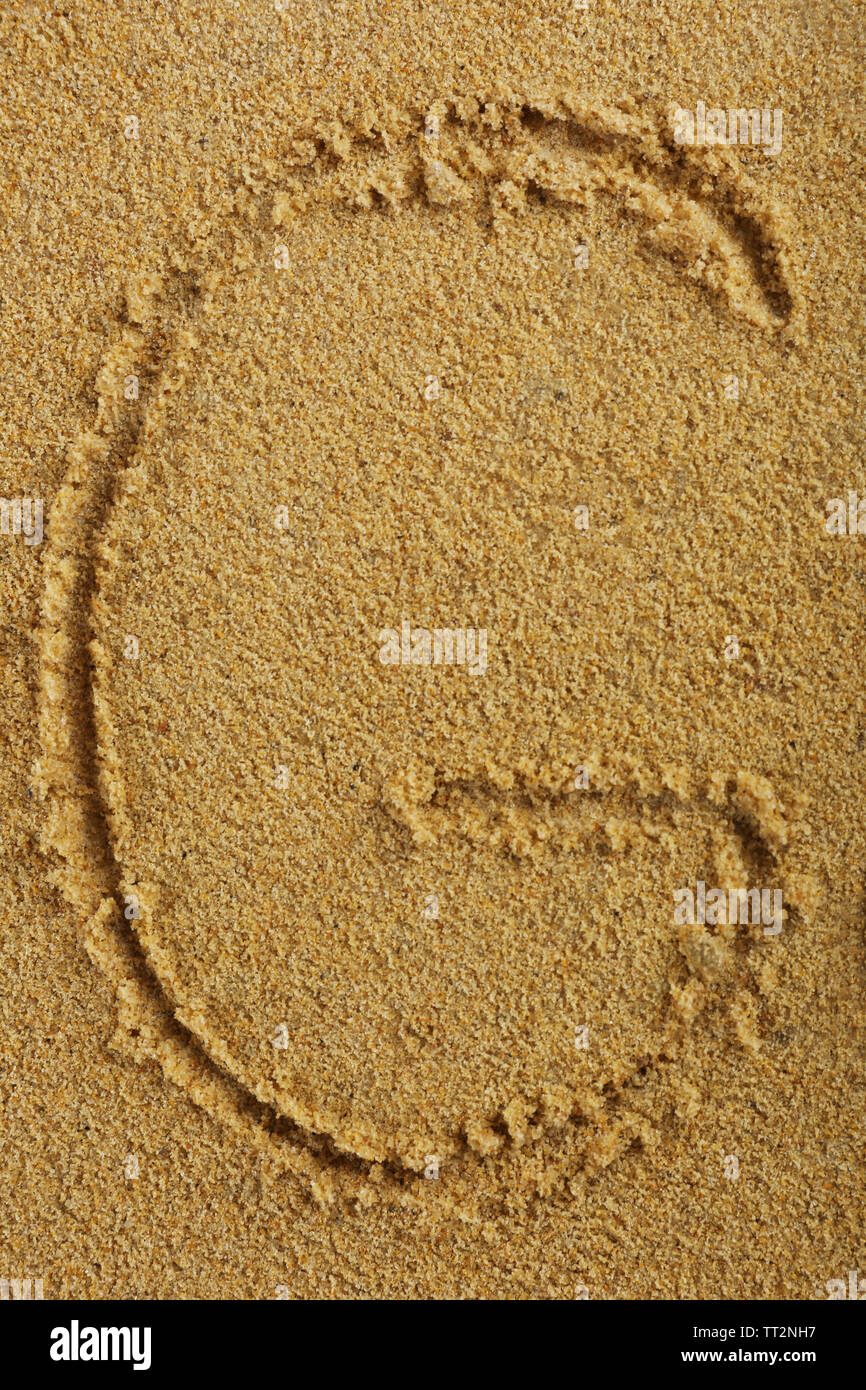 Alphabet letter written on wet beach sand Stock Photo - Alamy