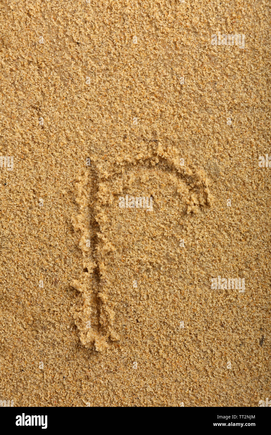Alphabet letter written on wet beach sand Stock Photo - Alamy