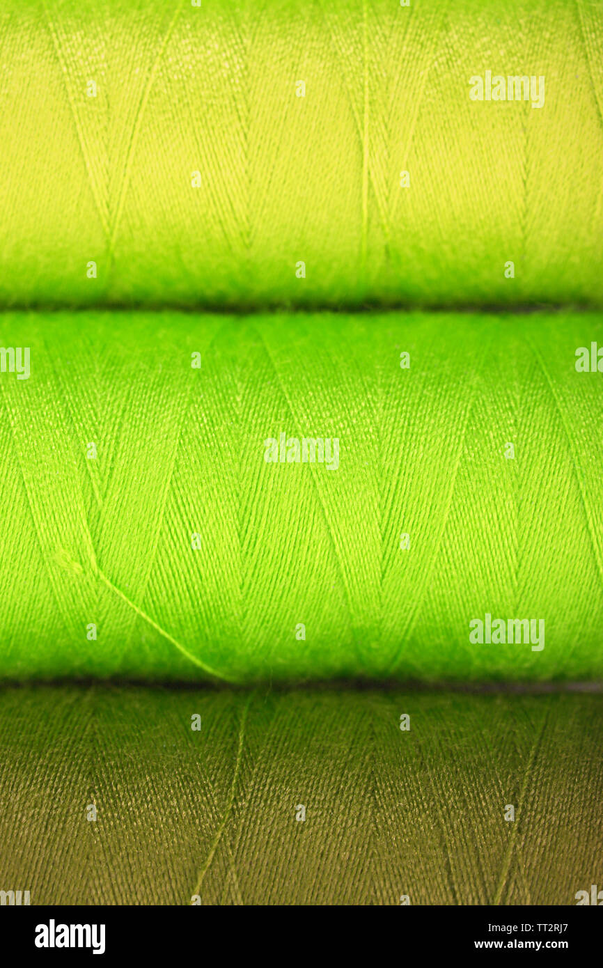 Color sewing threads background Stock Photo - Alamy