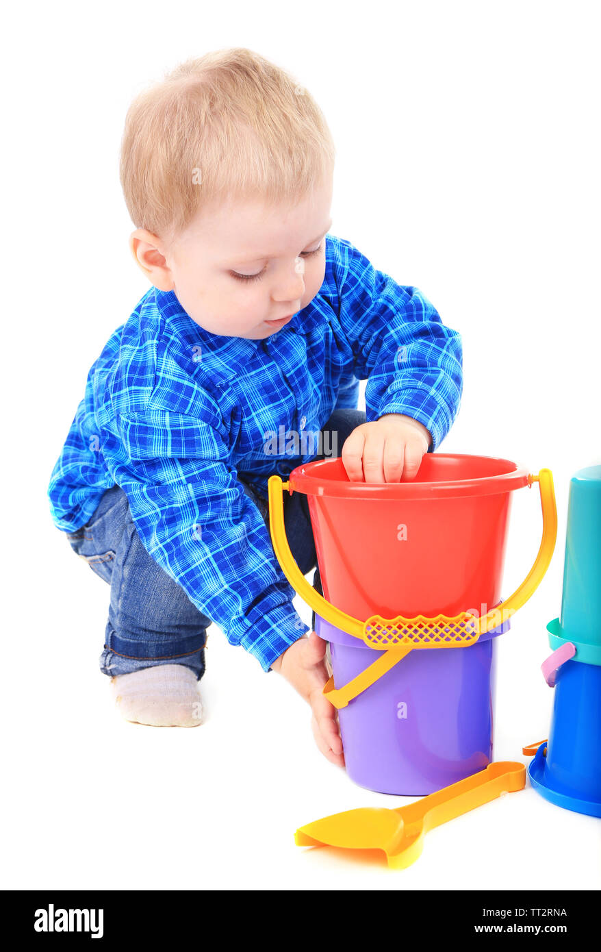 Cute little boy with plastic buckets isolated on white Stock Photo - Alamy