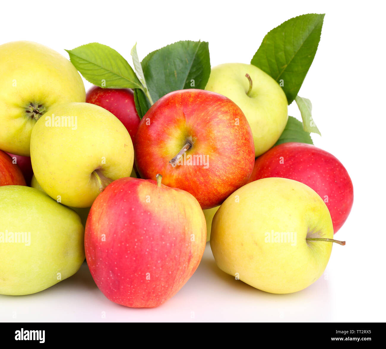 Ripe sweet apples with leaves, isolated on white Stock Photo - Alamy