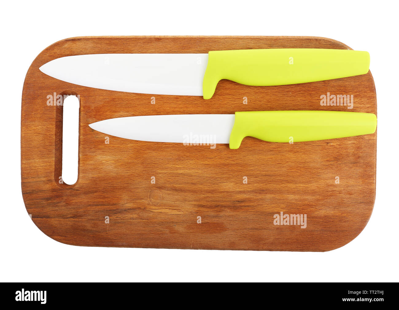 Kitchen knives and cutting board isolated on white Stock Photo - Alamy