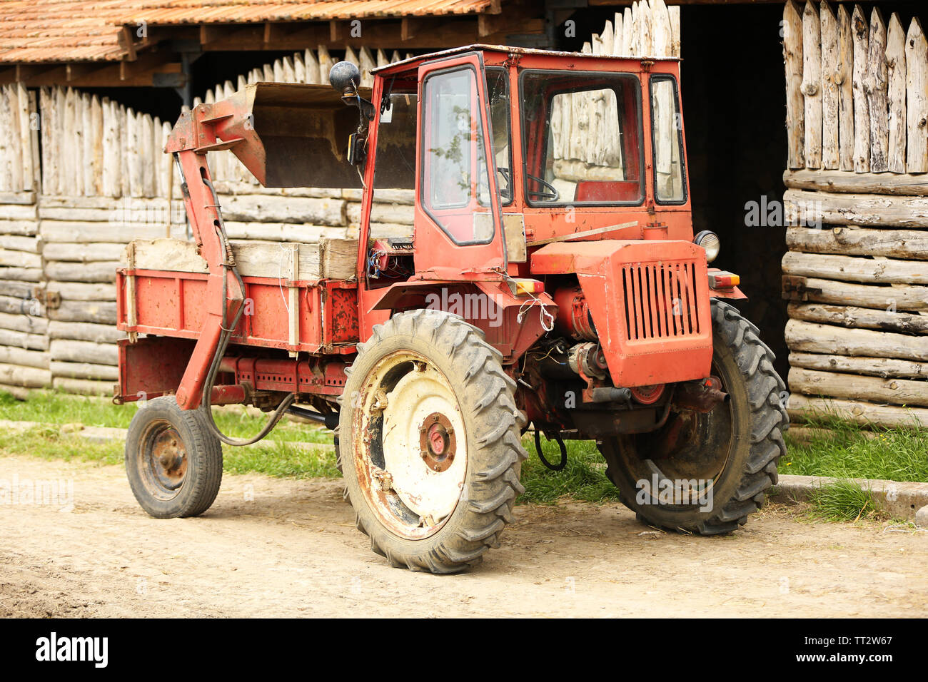 Old retro tractor Stock Photo - Alamy