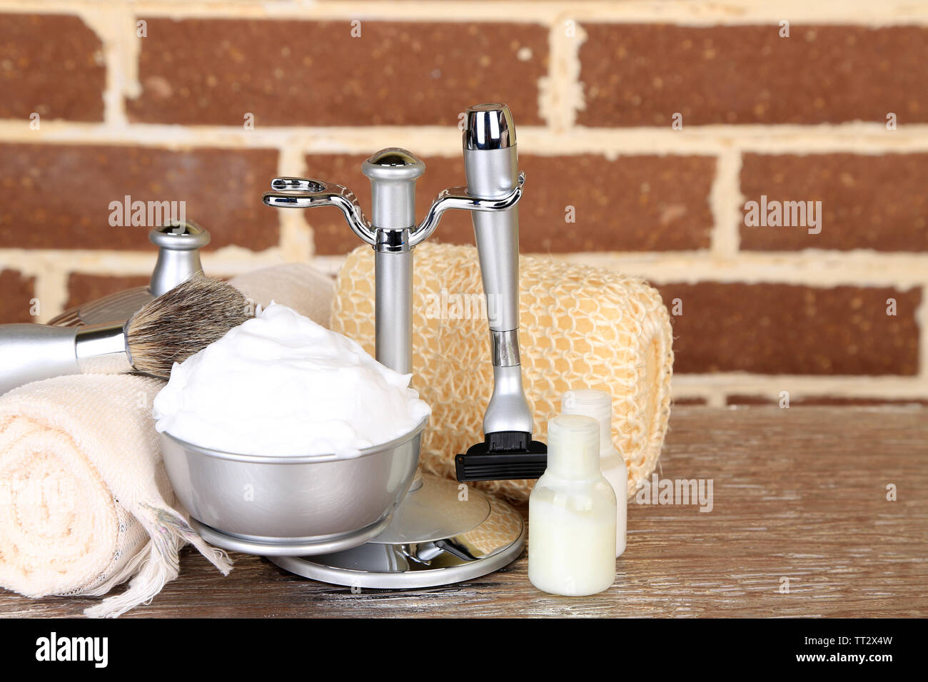 Male luxury shaving kit on shelf, on bricks wall background Stock Photo ...