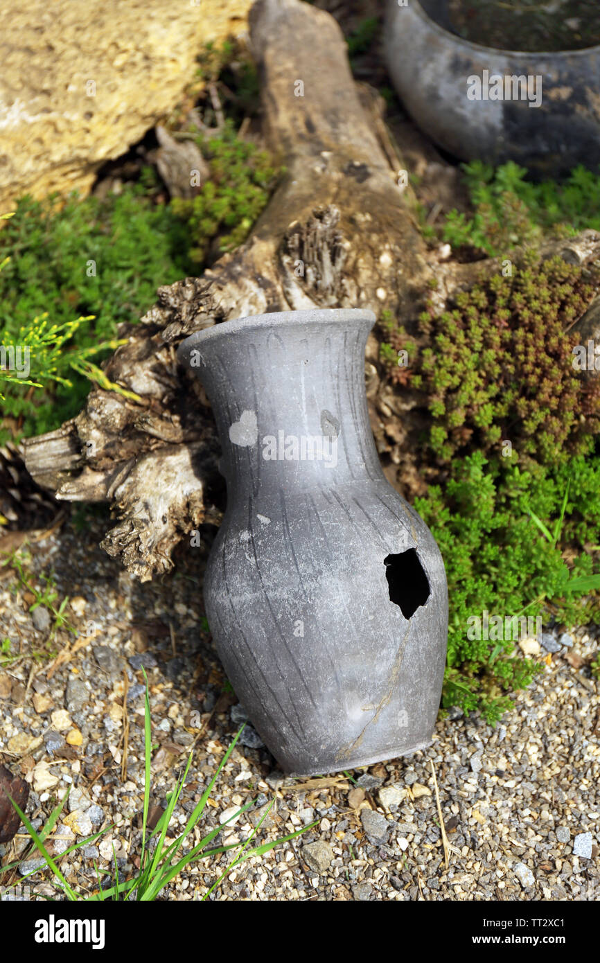 Old retro amphora in garden Stock Photo - Alamy