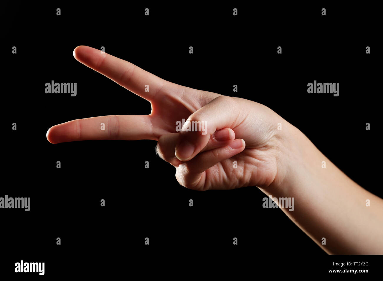 Human hand on black background Stock Photo - Alamy