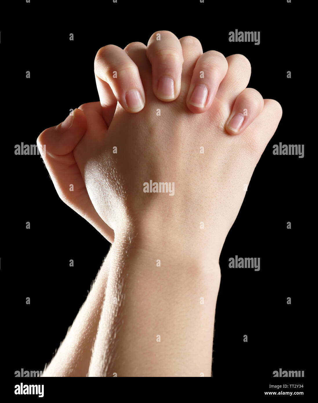 Human hands on black background Stock Photo - Alamy