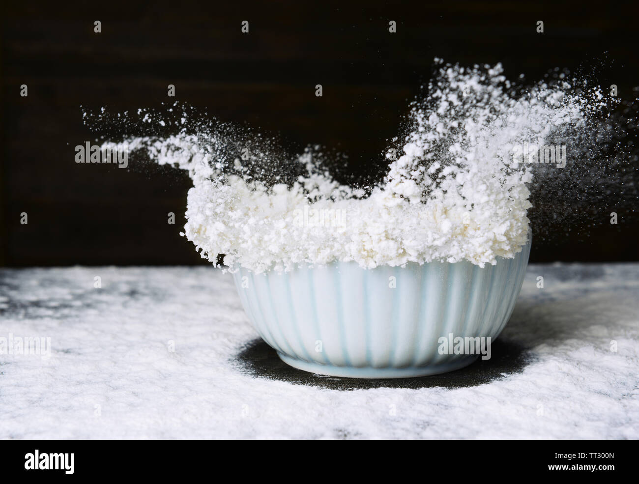 Sieving flour into mixing bowl hi-res stock photography and images - Alamy