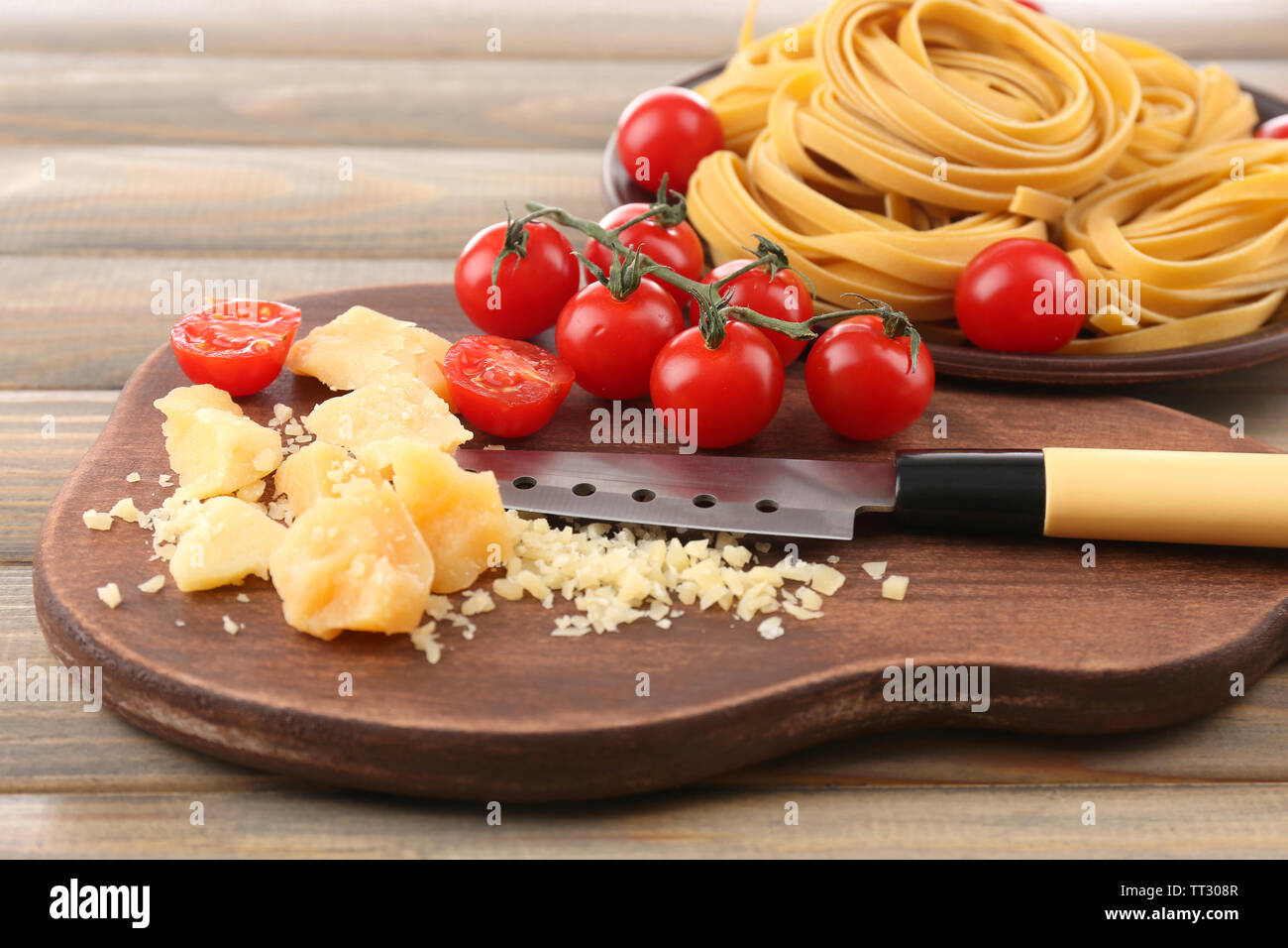 Still life with raw homemade pasta and ingredients for pasta Stock ...