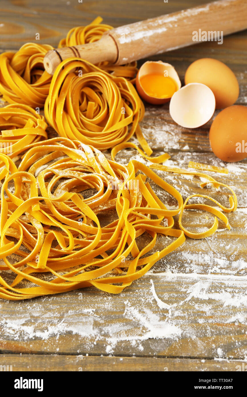 Still life with raw homemade pasta and ingredients for pasta Stock ...