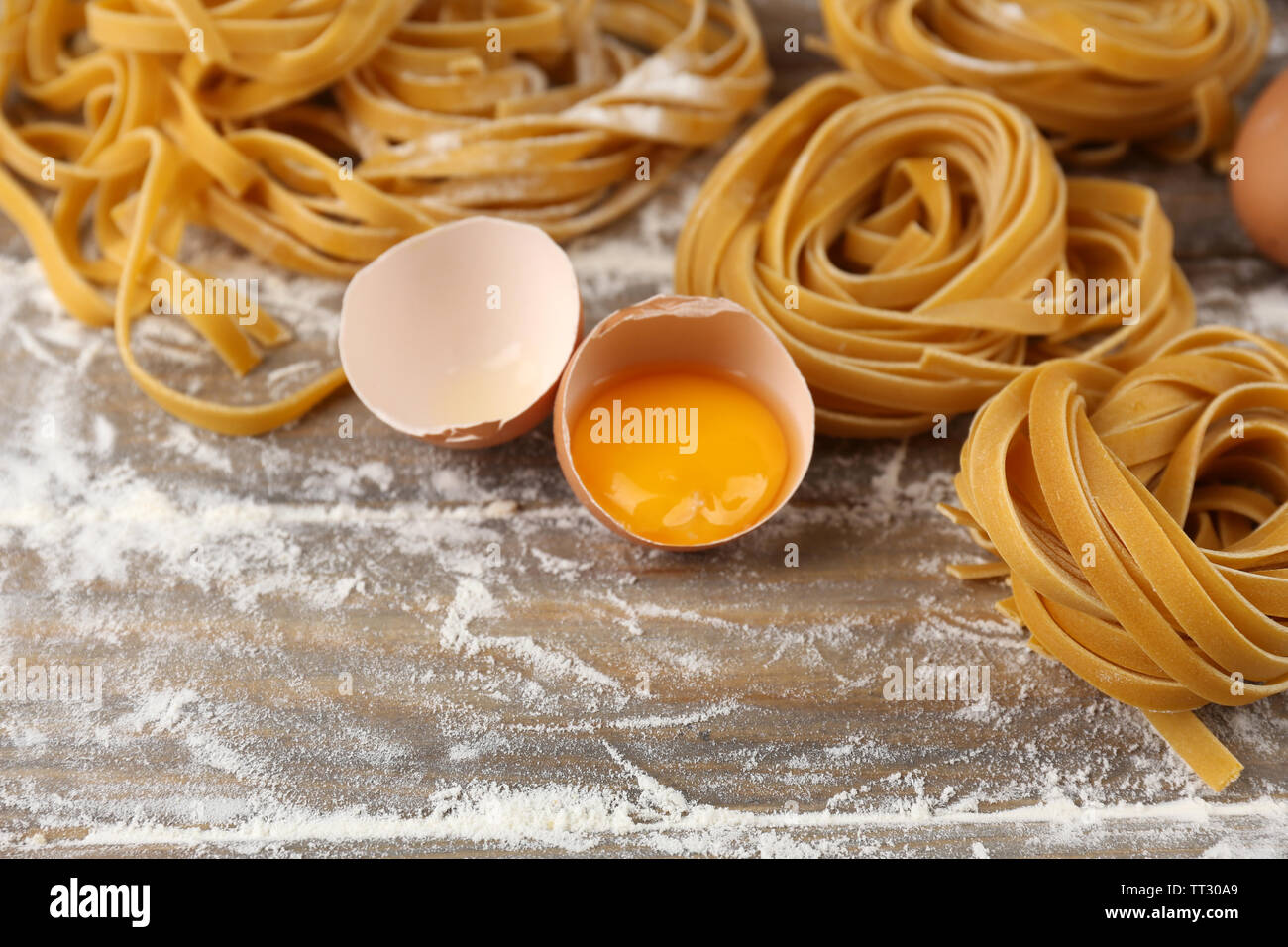 Still life with raw homemade pasta and ingredients for pasta Stock ...