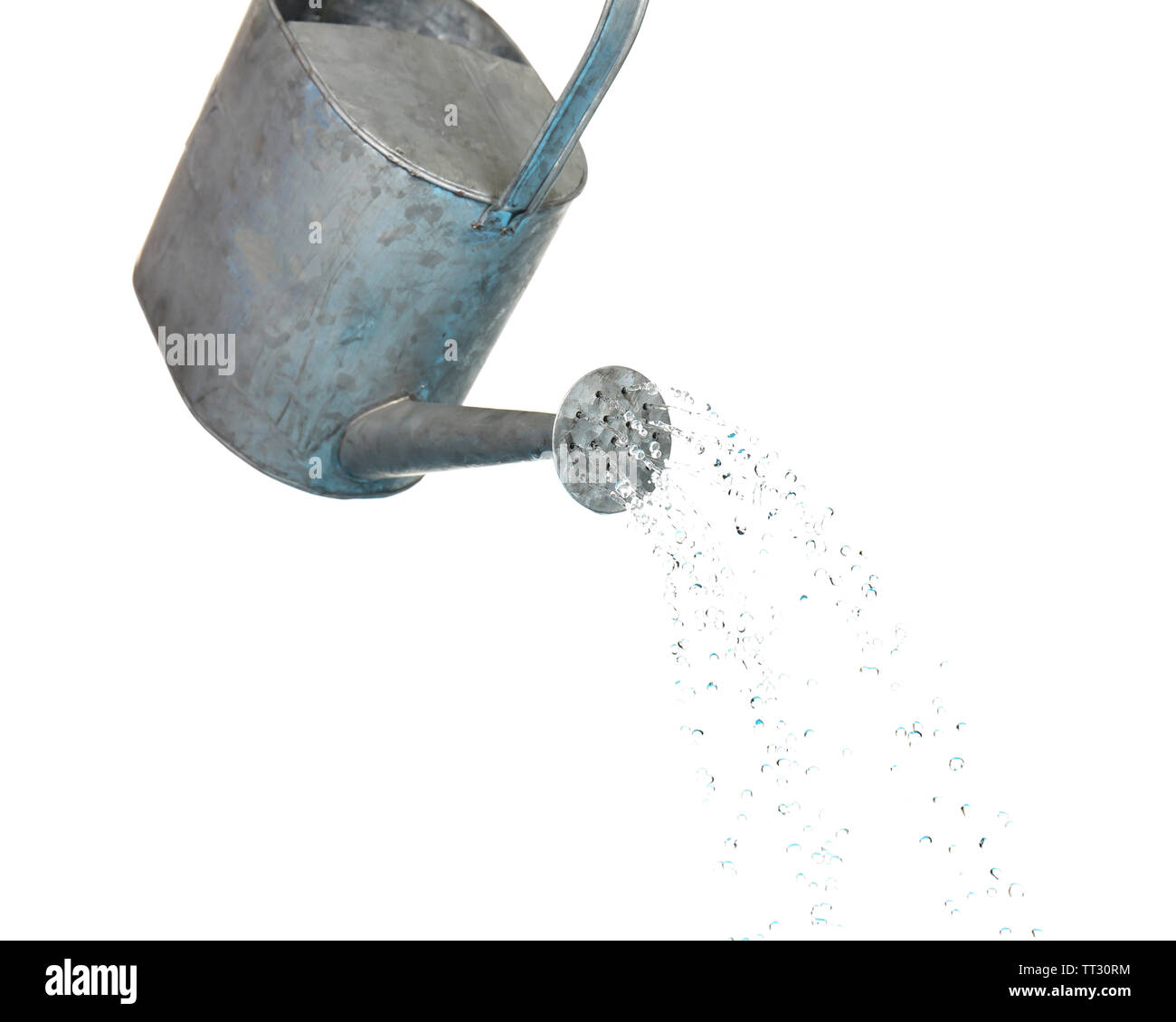 Water pouring from watering can isolated on white Stock Photo - Alamy