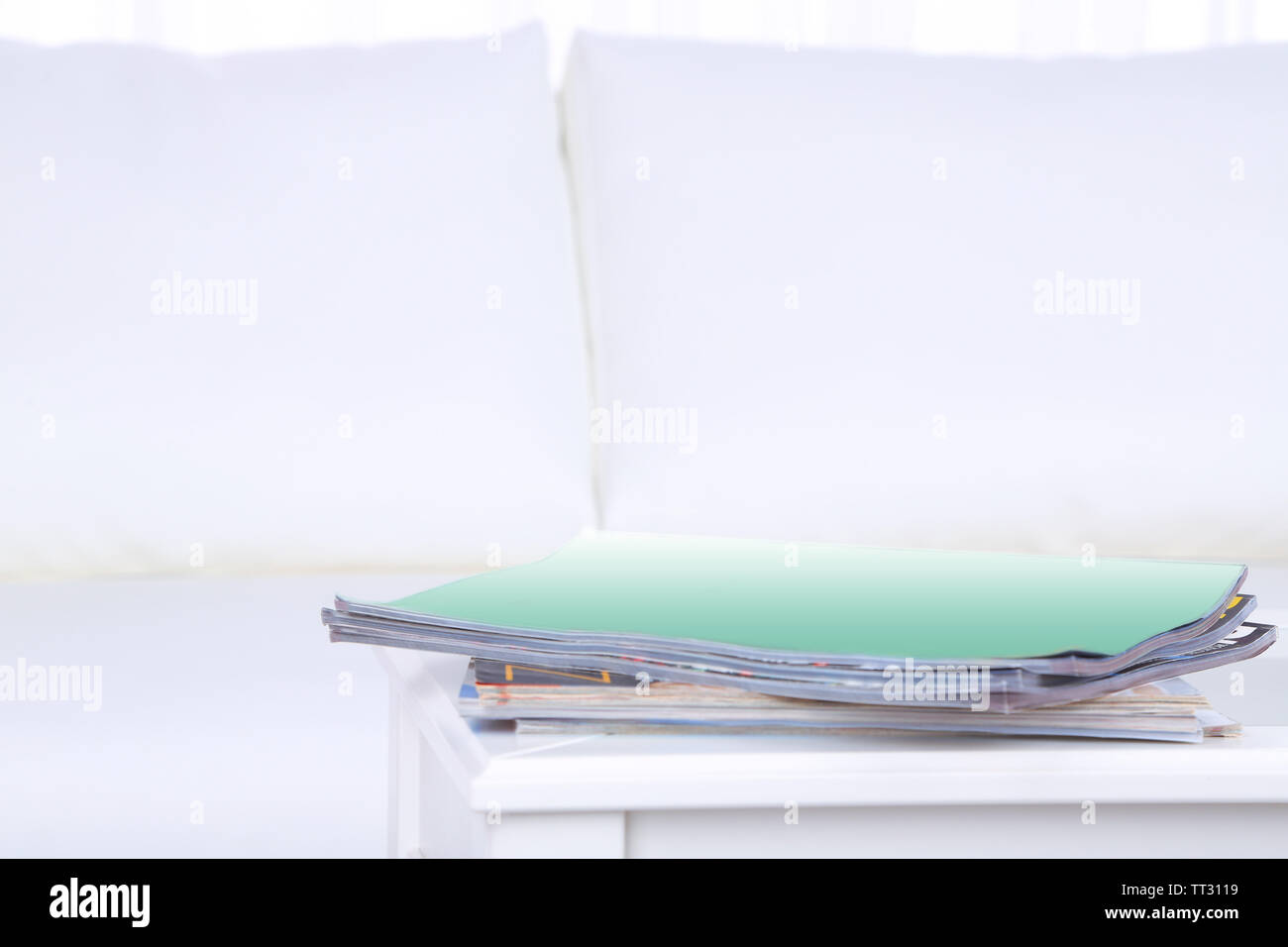 Pile magazines on table hi-res stock photography and images - Alamy