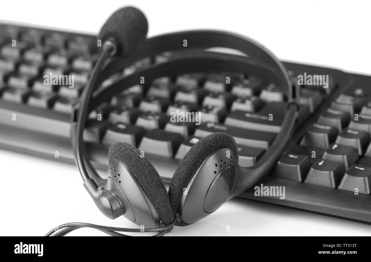 Headphone and keyboard, close-up, isolated on white Stock Photo - Alamy