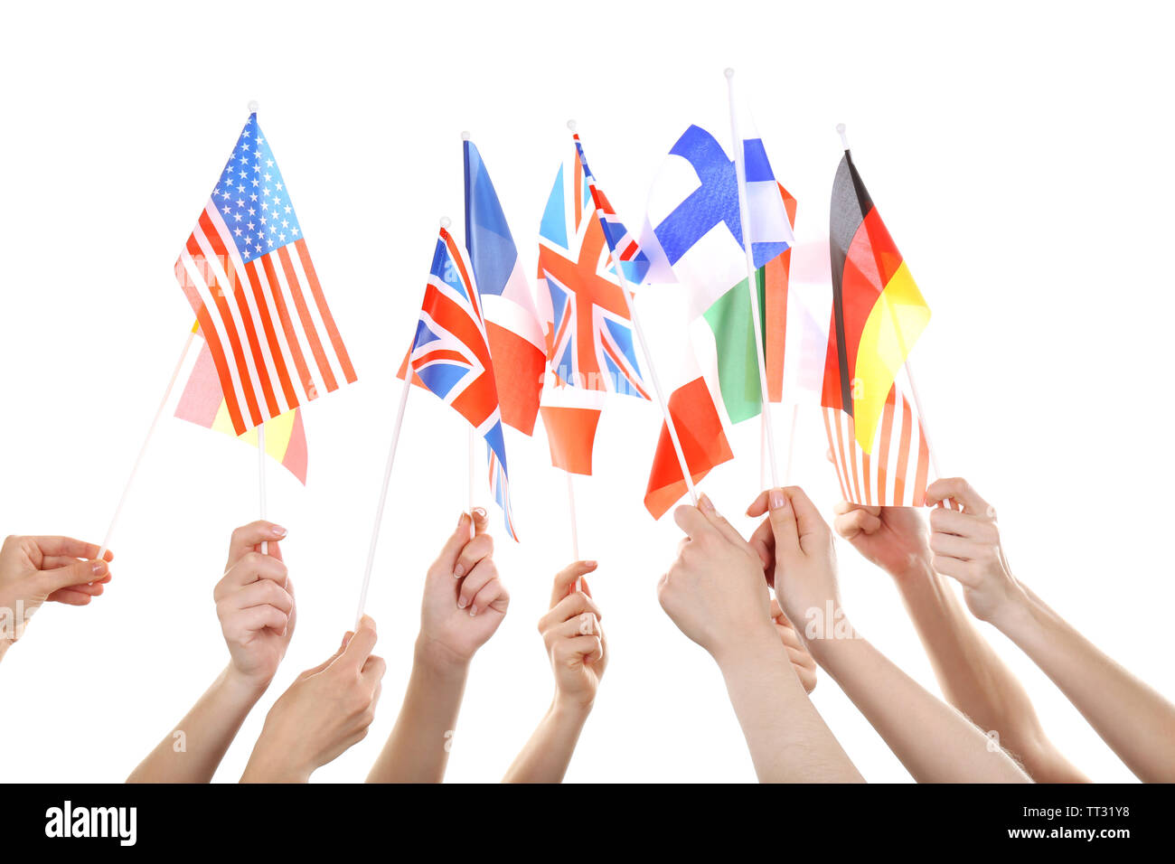 Hands holding different flags, isolated on white Stock Photo - Alamy