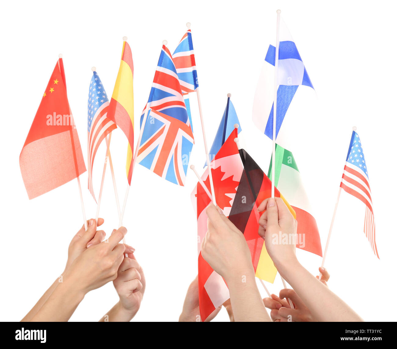 Hands holding different flags, isolated on white Stock Photo - Alamy