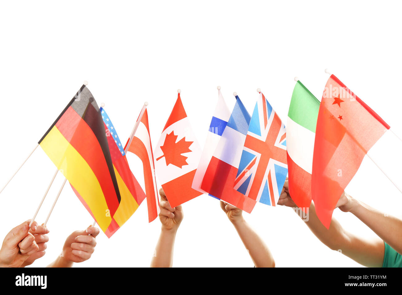 Hands holding different flags, isolated on white Stock Photo - Alamy