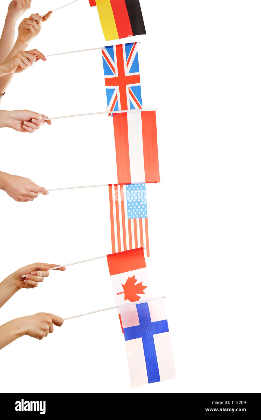 Hands holding different flags, isolated on white Stock Photo - Alamy