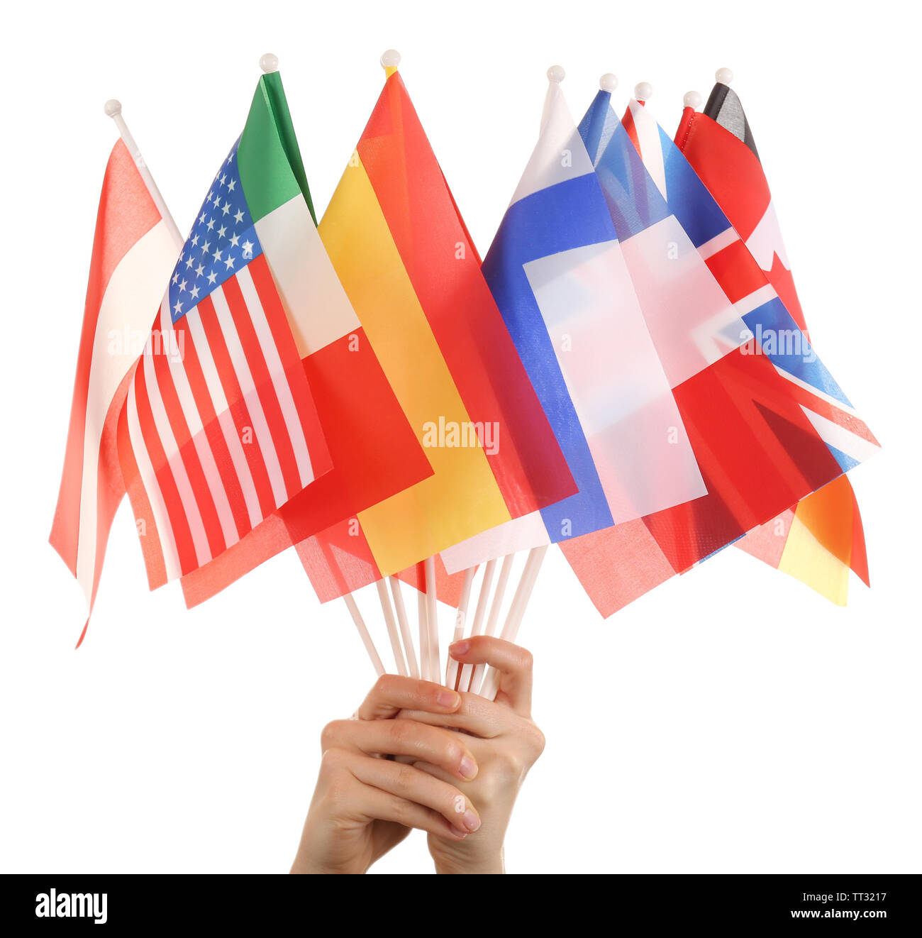Hands holding different flags, isolated on white Stock Photo - Alamy