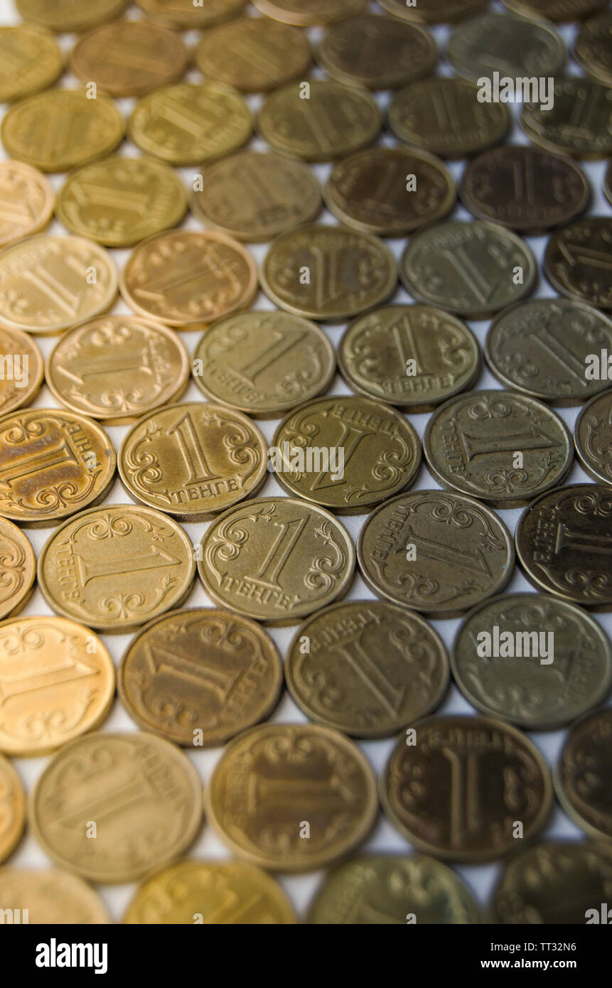 Large number of coins face value of one tenge closeup Stock Photo - Alamy
