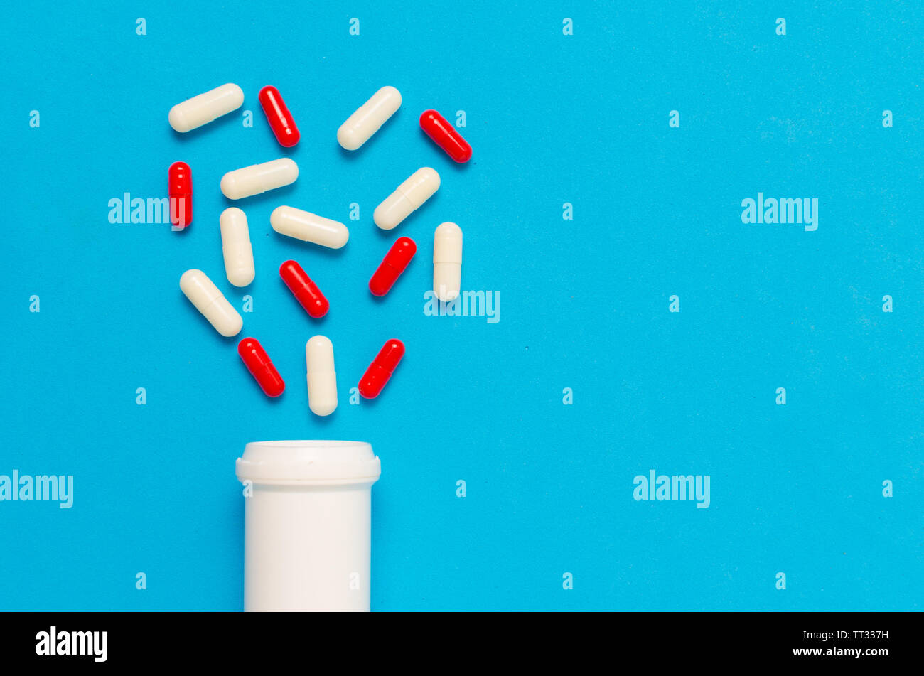 Variety of tablets and pills.Pharmaceuticals and antibiotics heart ...