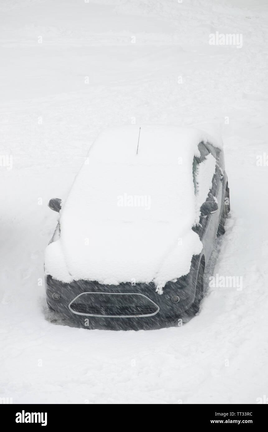 Car is covered with snow, snow cyclone, Blizzard. Storm.The concept of ...