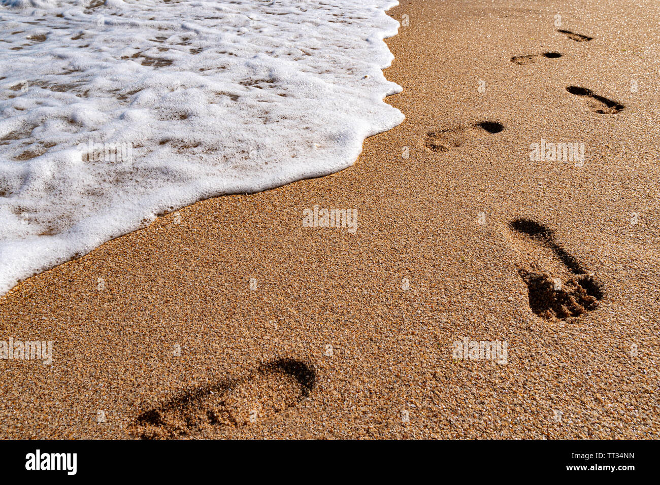 Human footprints on tropical hi-res stock photography and images - Alamy