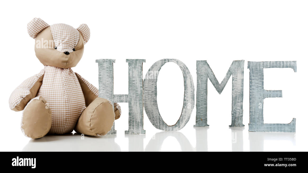 Decorative letters forming word HOME with teddy bear isolated on white ...