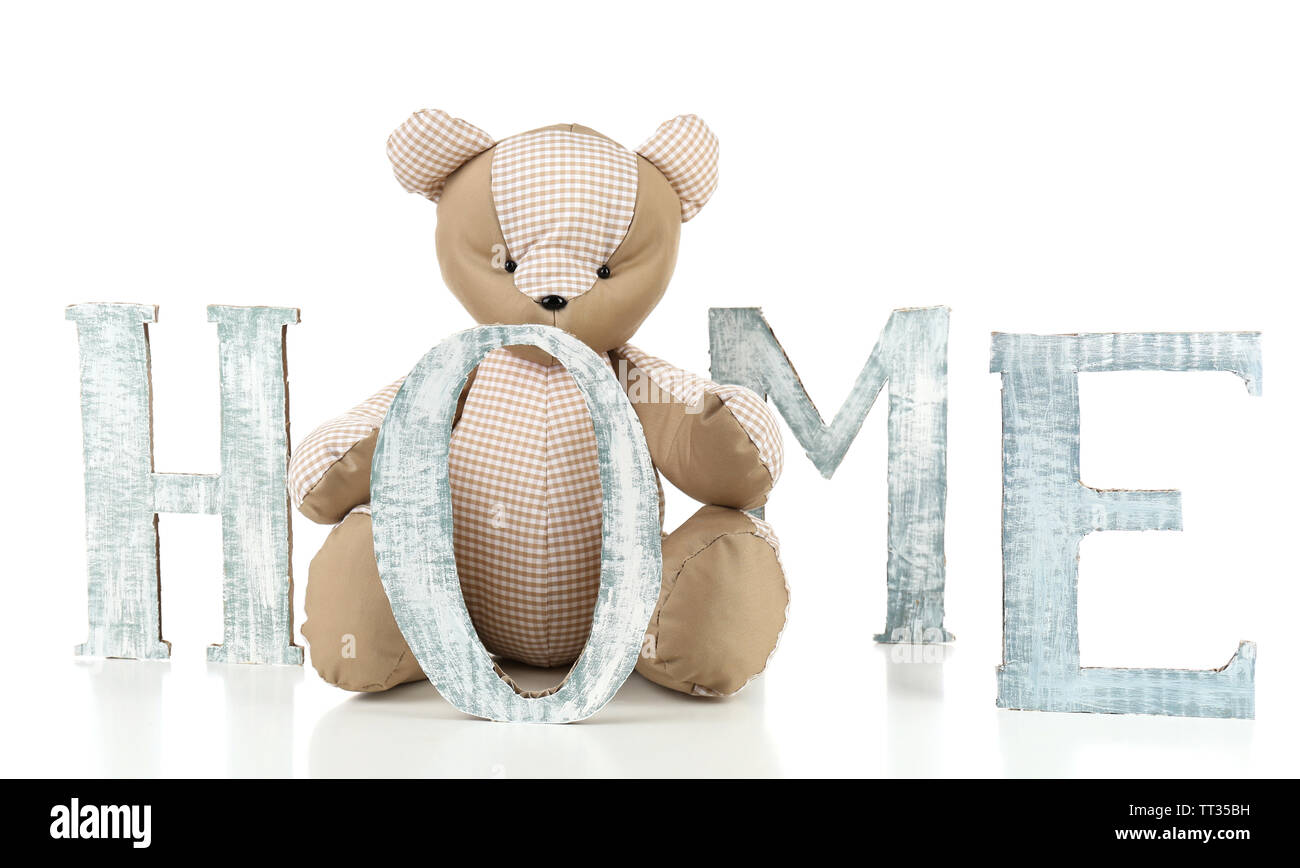 Decorative letters forming word HOME with teddy bear isolated on white ...