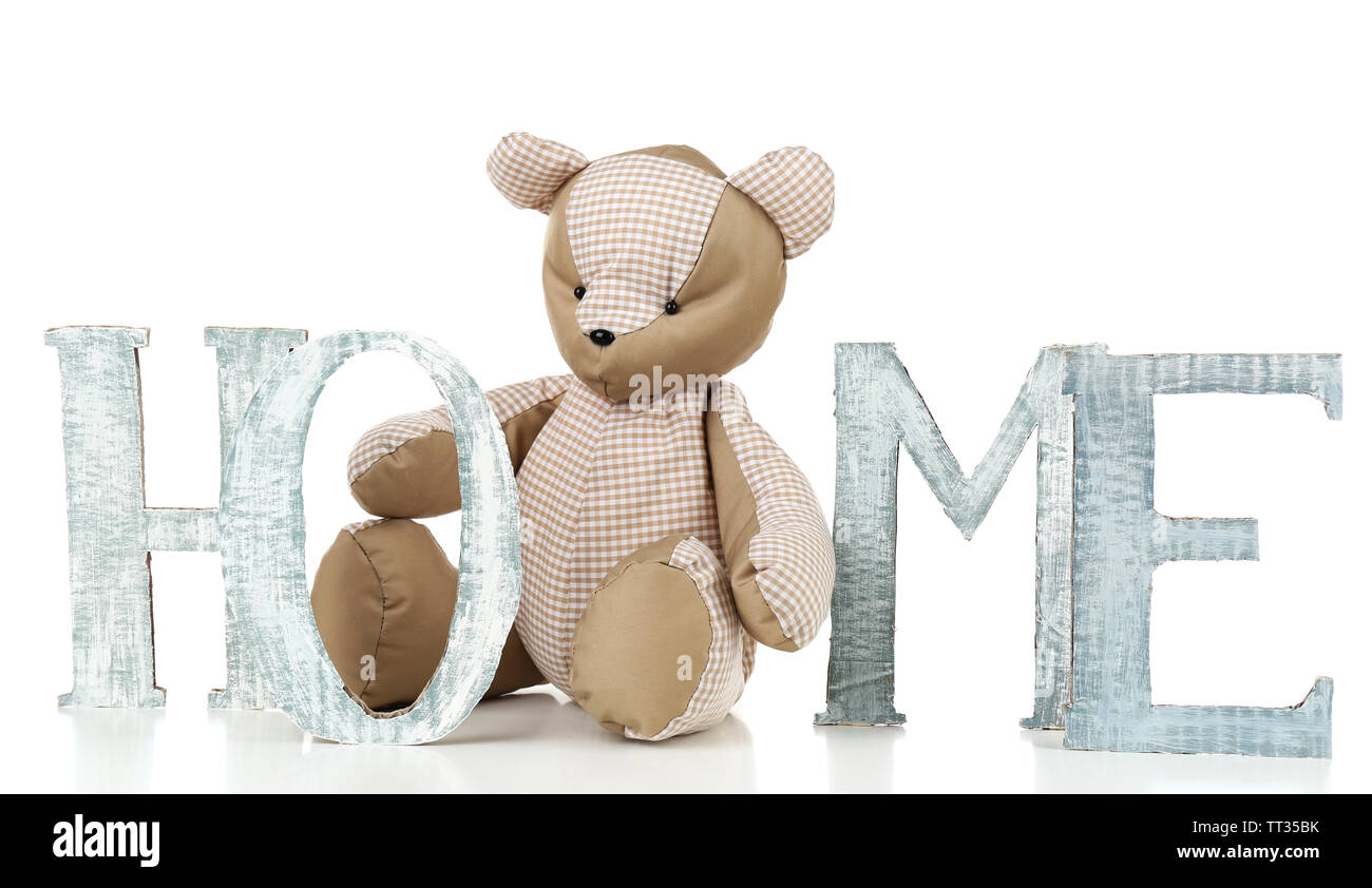 Decorative letters forming word HOME with teddy bear isolated on white ...