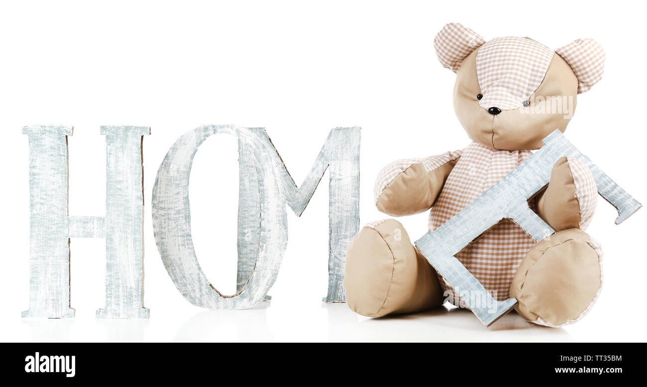 Decorative letters forming word HOME with teddy bear isolated on white ...