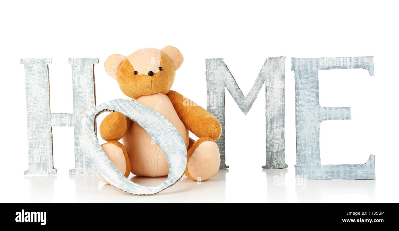 Decorative letters forming word HOME with teddy bear isolated on white ...
